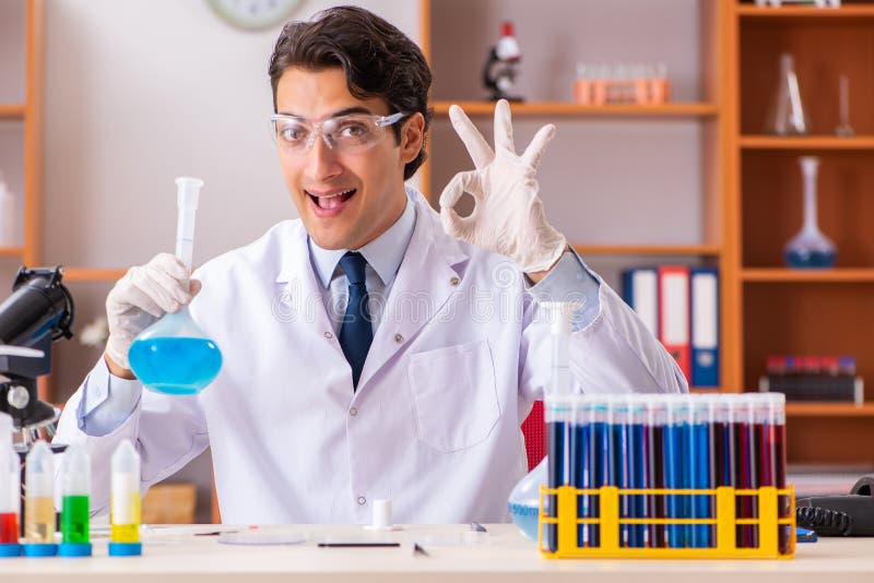 The Young Handsome Biochemist Working in the Lab Stock Image - Image of ...