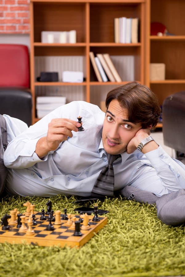 The Young Handsome Boss Playing Chess during Break Stock Photo - Image ...