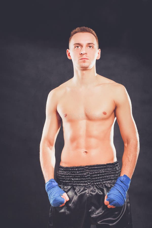 Young Handsome Boxer Man Standing Near Board , Isolated on Black ...