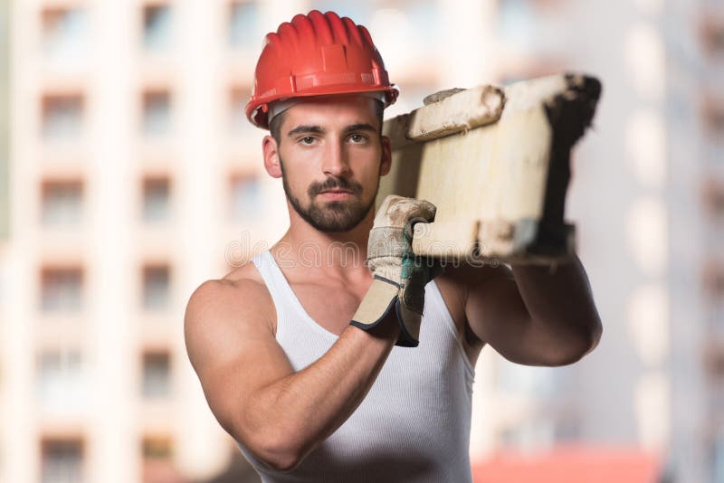 Young Handsome Builder with Wood Planks Stock Image - Image of staff ...