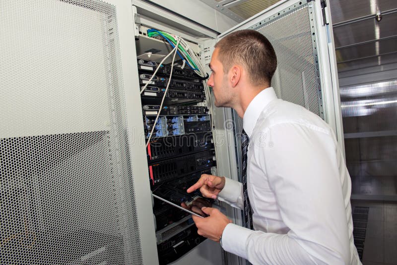 Young Handsome Business Man Engeneer in Datacenter Server Room Stock ...