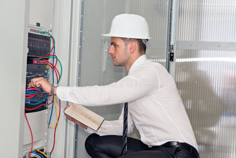 Young Handsome Business Man Engeneer in Datacenter Server Room Stock ...