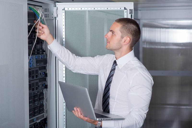 Young Handsome Business Man Engeneer in Datacenter Server Room Stock ...