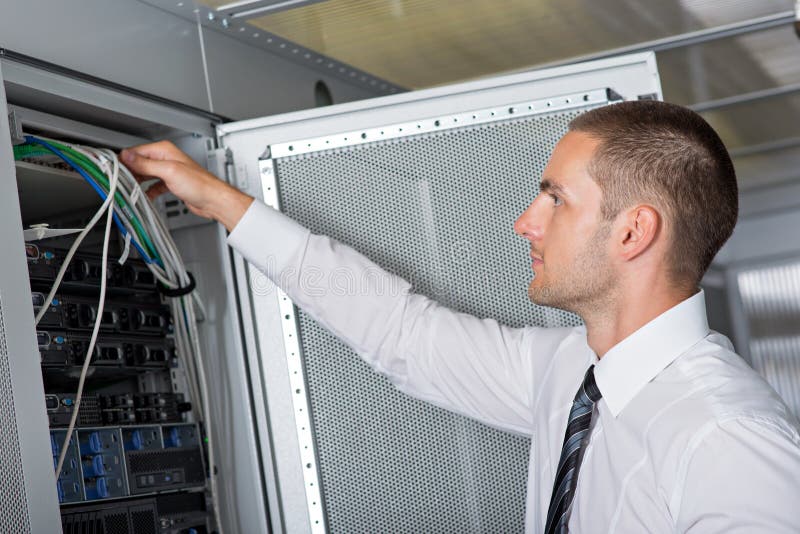 Young Handsome Business Man Engeneer in Datacenter Server Room Stock ...
