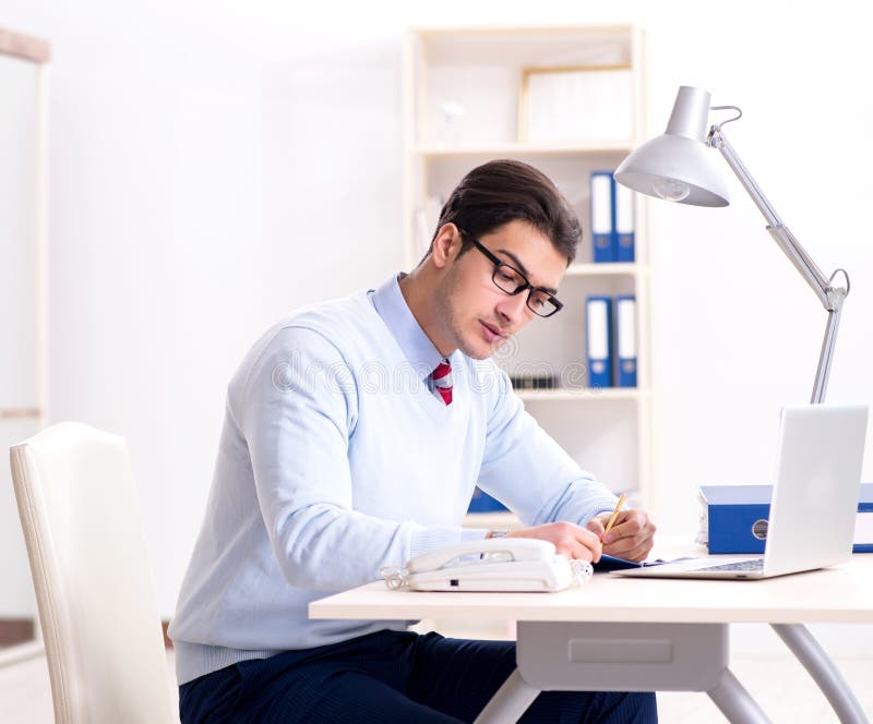 Young Handsome Businessman Employee Working in Office at Desk Stock ...