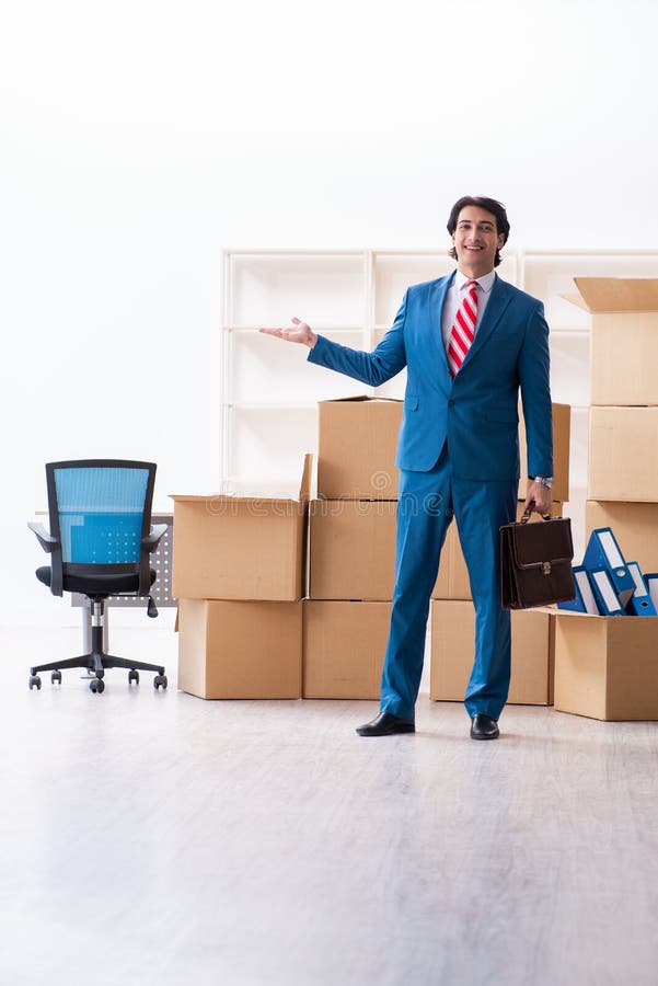 Young Handsome Businessman Moving To New Workplace Stock Photo - Image ...