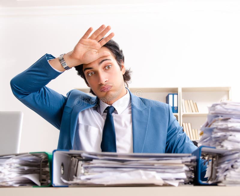 Young Handsome Busy Employee Sitting in Office Stock Image - Image of ...