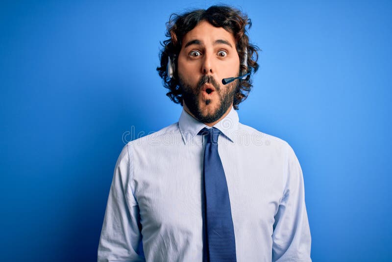 Young Handsome Call Center Agent Man with Beard Working Using Headset ...