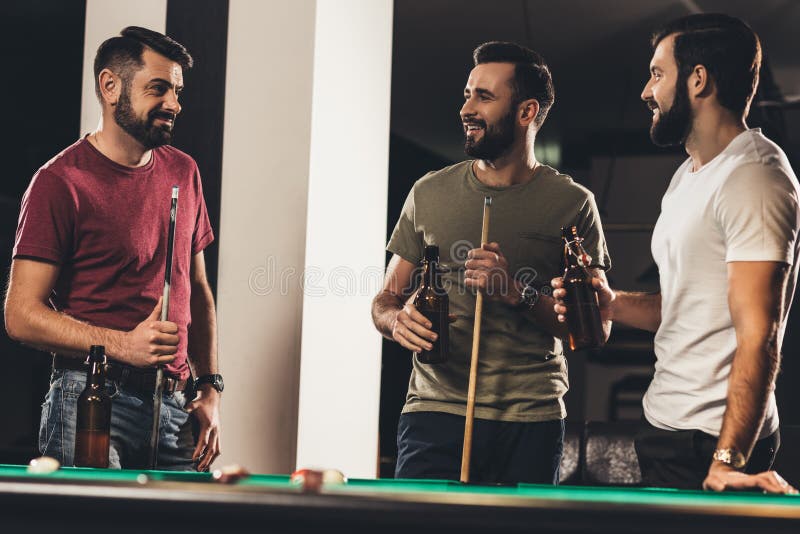 Young Handsome Caucasian Men beside Billiard Table in Bar Stock Photo ...