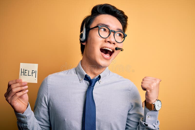 Young Handsome Chinese Call Center Agent Man Overworked Using Headset ...