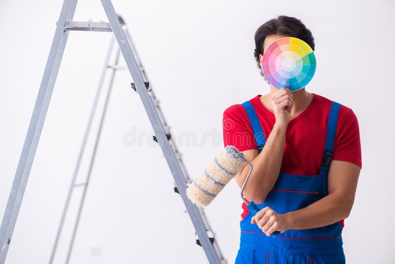 The Young Handsome Contractor Working Indoors Stock Image - Image of ...