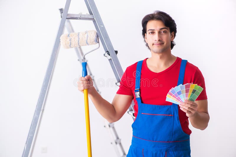 The Young Handsome Contractor Working Indoors Stock Photo - Image of ...
