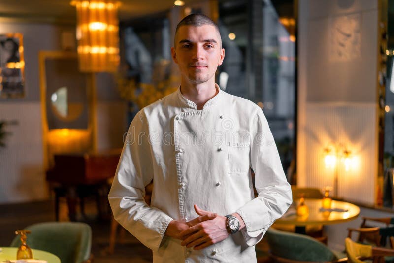 Young Handsome Cook Chief Posing in Modern Restaurant Interior Stock ...