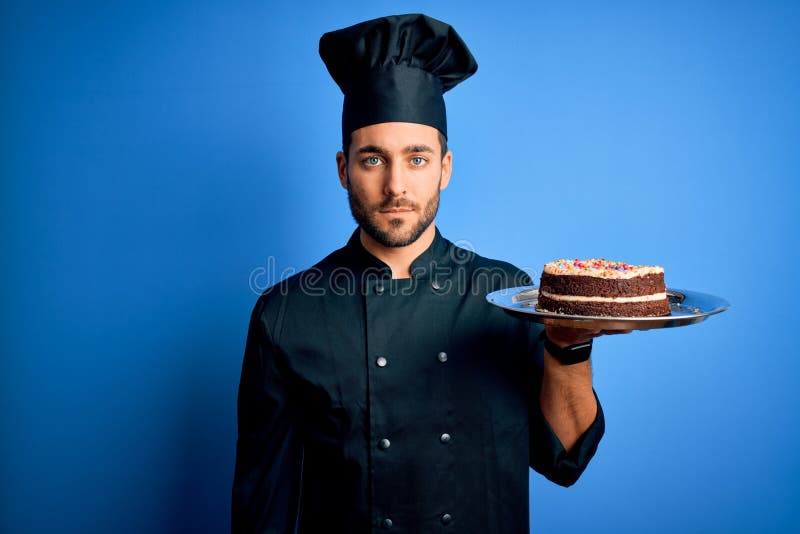 Young Handsome Cooker Man with Beard Wearing Uniform and Hat Holding ...