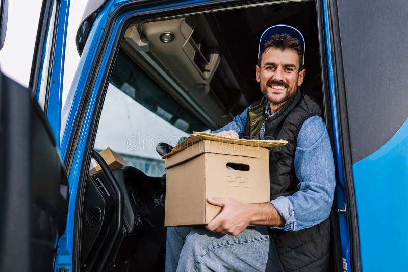 Handsome Delivery Guy Getting His Deliveries Ready Stock Image - Image ...