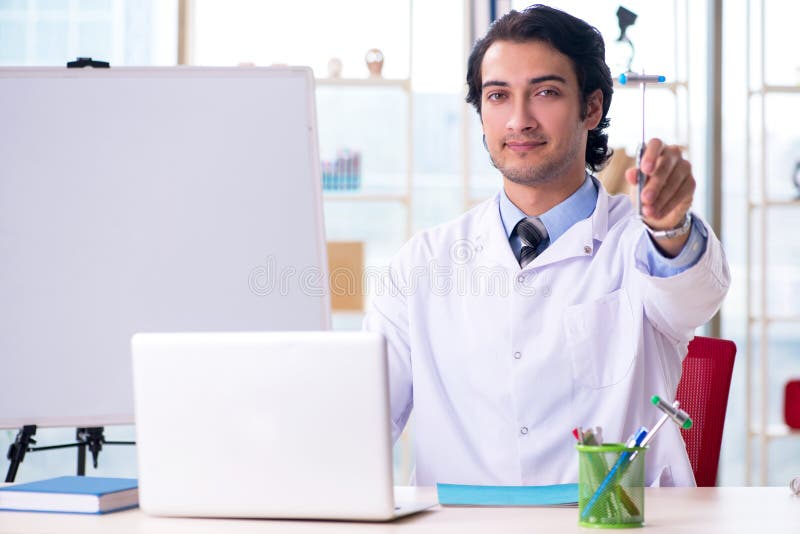 The Young Handsome Doctor in Front of Whiteboard Stock Photo - Image of ...