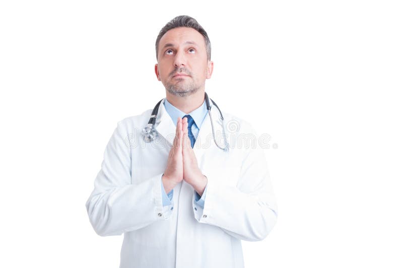 Young and Handsome Doctor or Medic Praying Stock Photo - Image of ...