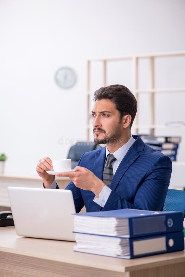 Young Handsome Employee Drinking Coffee during Break Stock Image ...