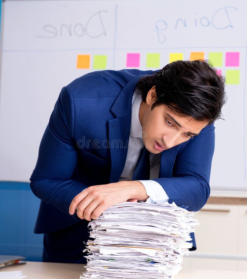 Young Handsome Employee in Front of Whiteboard with To-do List Stock ...