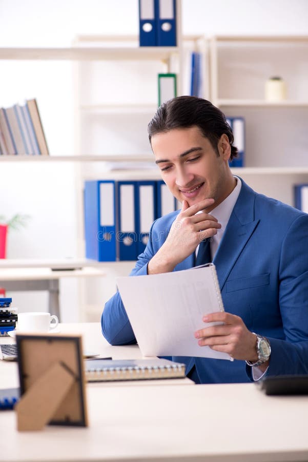 Young Handsome Employee in the Office Stock Image - Image of ...