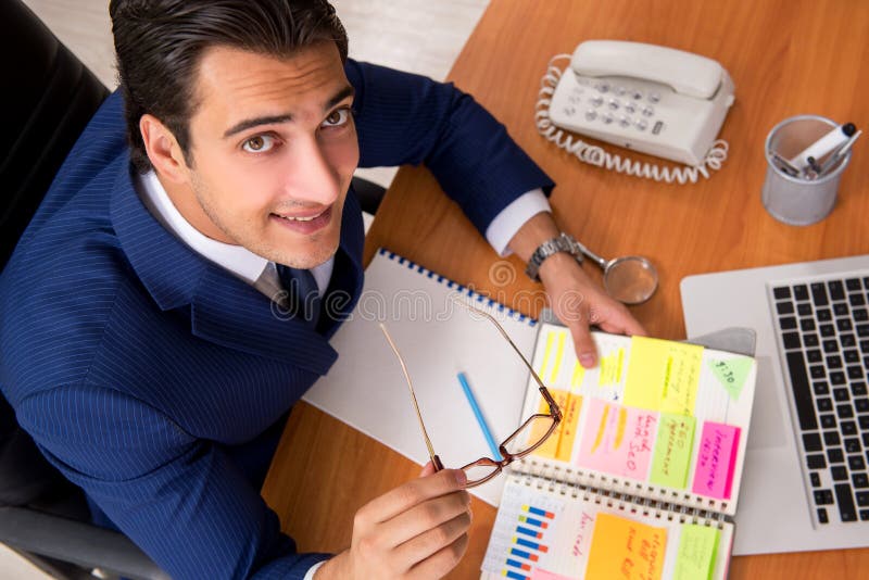 Handsome Man Planning His Schedule With Calendar App On Computer Stock ...