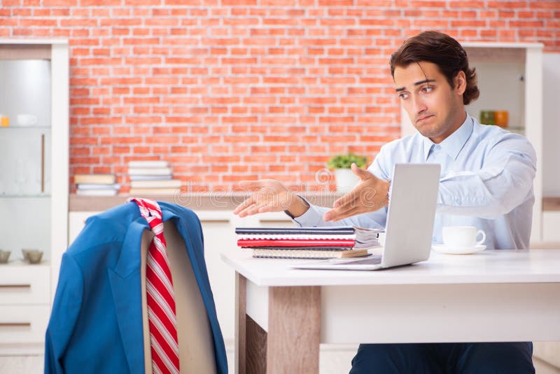 The Young Handsome Employee Working in the Office Stock Photo - Image ...