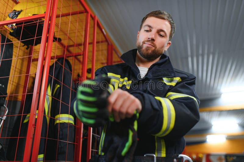 Young Handsome Fireman in the Fire Department Stock Photo - Image of ...