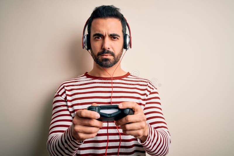 Young Handsome Gamer Man with Beard Playing Video Game Using Joystick ...