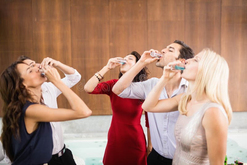 Friends Drinking White Wine And Sharing Cupcakes At Party Stock Image ...