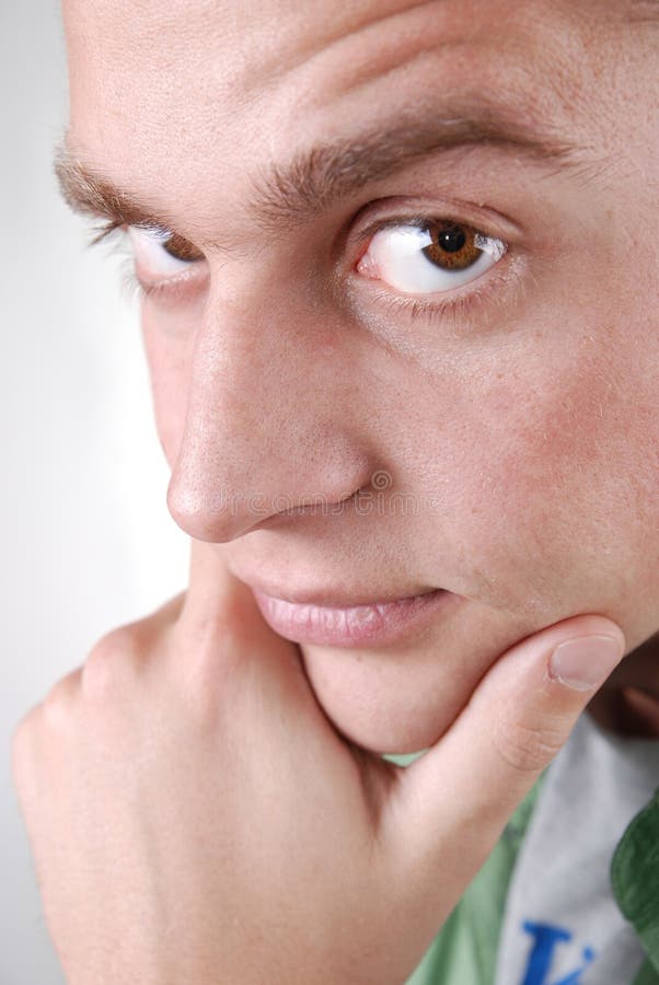 Young Handsome Guy Looking Suspiciously To the C Stock Photo - Image of ...