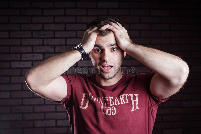 Young handsome guy scared stock image. Image of fear - 67028735