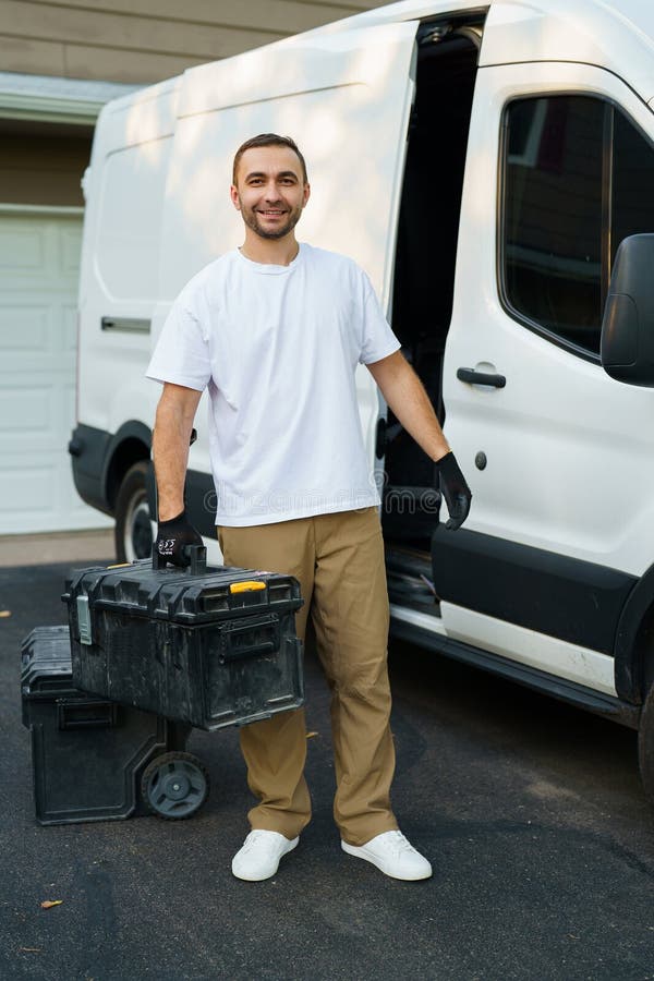 Young Handsome Handyman with Tools Box Near Trunk Outdoors Stock Photo ...