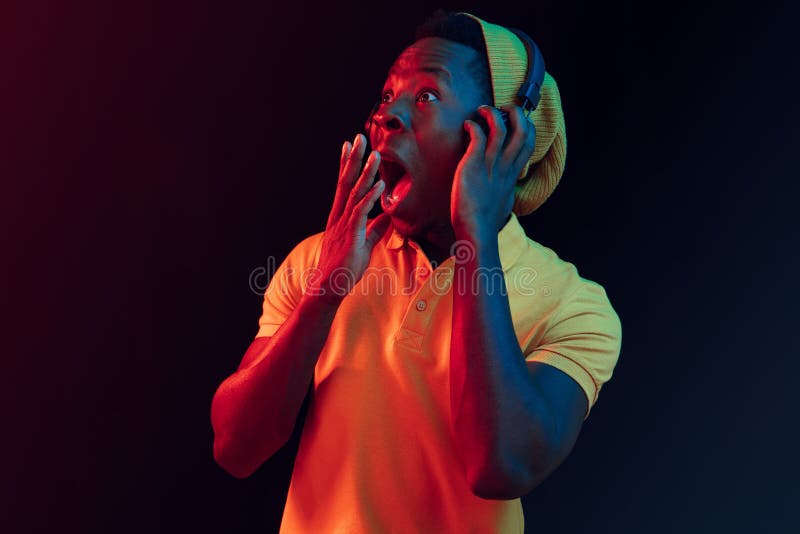 The Young Handsome Hipster Man Listening Music With Headphones Stock