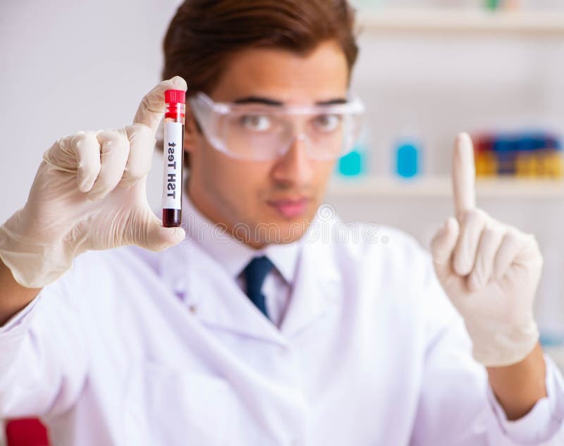 Young Handsome Lab Assistant Testing Blood Samples in Hospital Stock ...