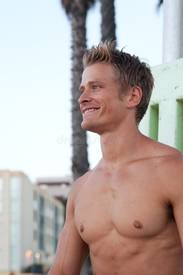 Young handsome lifeguard stock photo. Image of person - 26563104