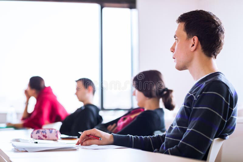 Young, Handsome Male College Student Sitting in a Classroom Stock Image ...