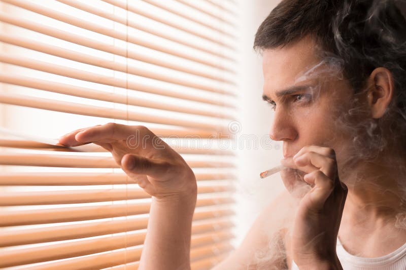 Young Handsome Male Looking through Window. Stock Photo - Image of ...