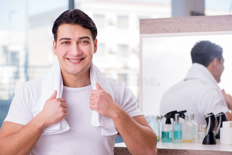 The Young Handsome Man Applying Face Cream Stock Image - Image of care ...