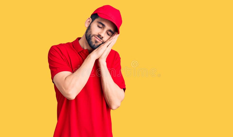 Young Handsome Man With Beard Wearing Delivery Uniform Sleeping Tired