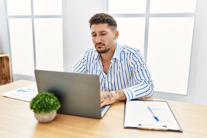 Young Handsome Man with Beard Working at the Office Using Computer ...