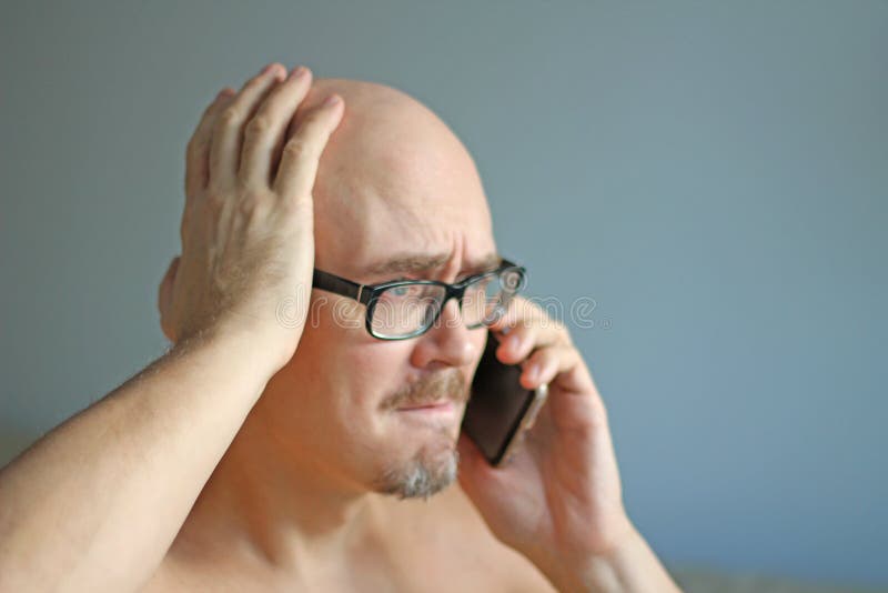 Young Handsome Man In Black Glasses Is Talking On The Phone Big