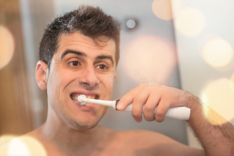 Young Handsome Man Brushing His Teeth Stock Photo - Image of attractive ...