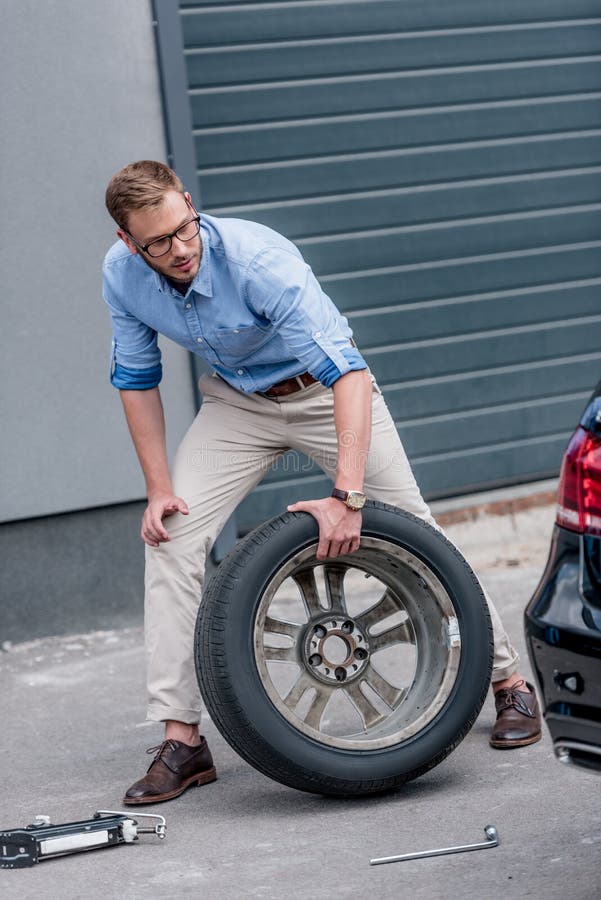 Young Handsome Man Changing Car Stock Photo - Image of automobile ...