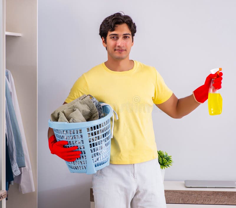 Young Handsome Man Cleaning in the Bedroom Stock Photo - Image of home ...