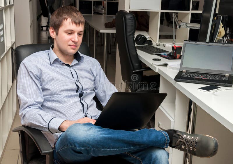 Young Handsome Man with Computer in the Office Stock Photo - Image of ...