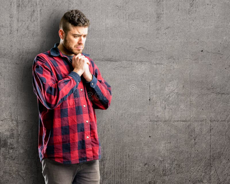 Young Handsome Man Over Wall Background Stock Image - Image of sadness ...