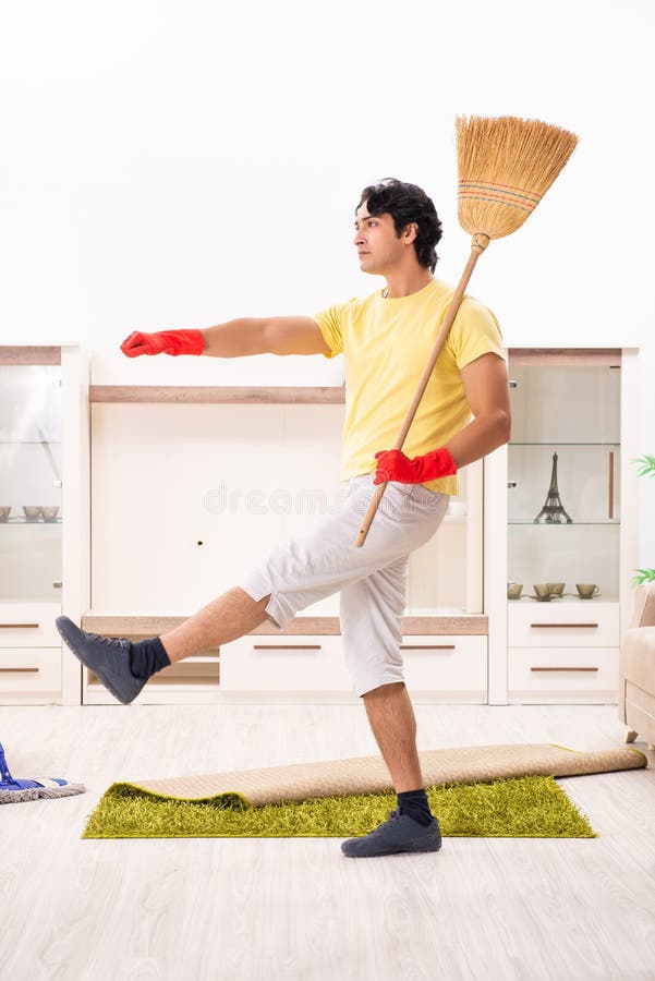 The Young Handsome Man Doing Housework Stock Photo - Image of cleaning ...