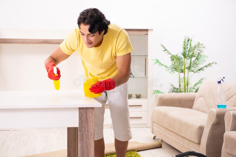 The Young Handsome Man Doing Housework Stock Photo - Image of dusty ...