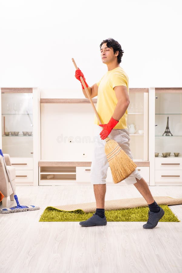 The Young Handsome Man Doing Housework Stock Photo - Image of broom ...