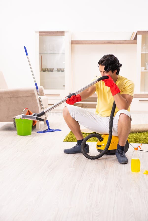 The Young Handsome Man Doing Housework Stock Photo - Image of electric ...
